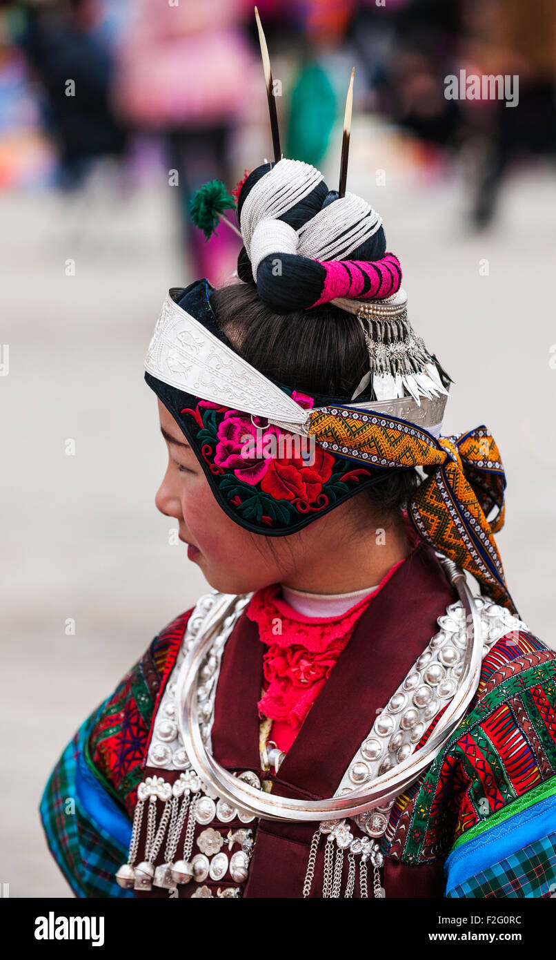 Miao woman in traditional costume and silver jewellery at the Lusheng ...