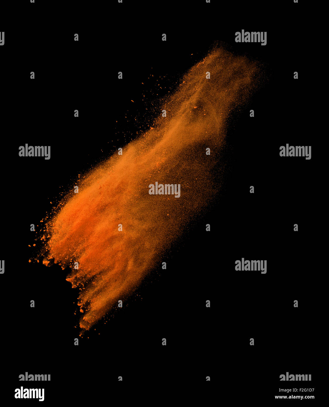 Freeze motion of red dust explosion isolated on black background Stock ...