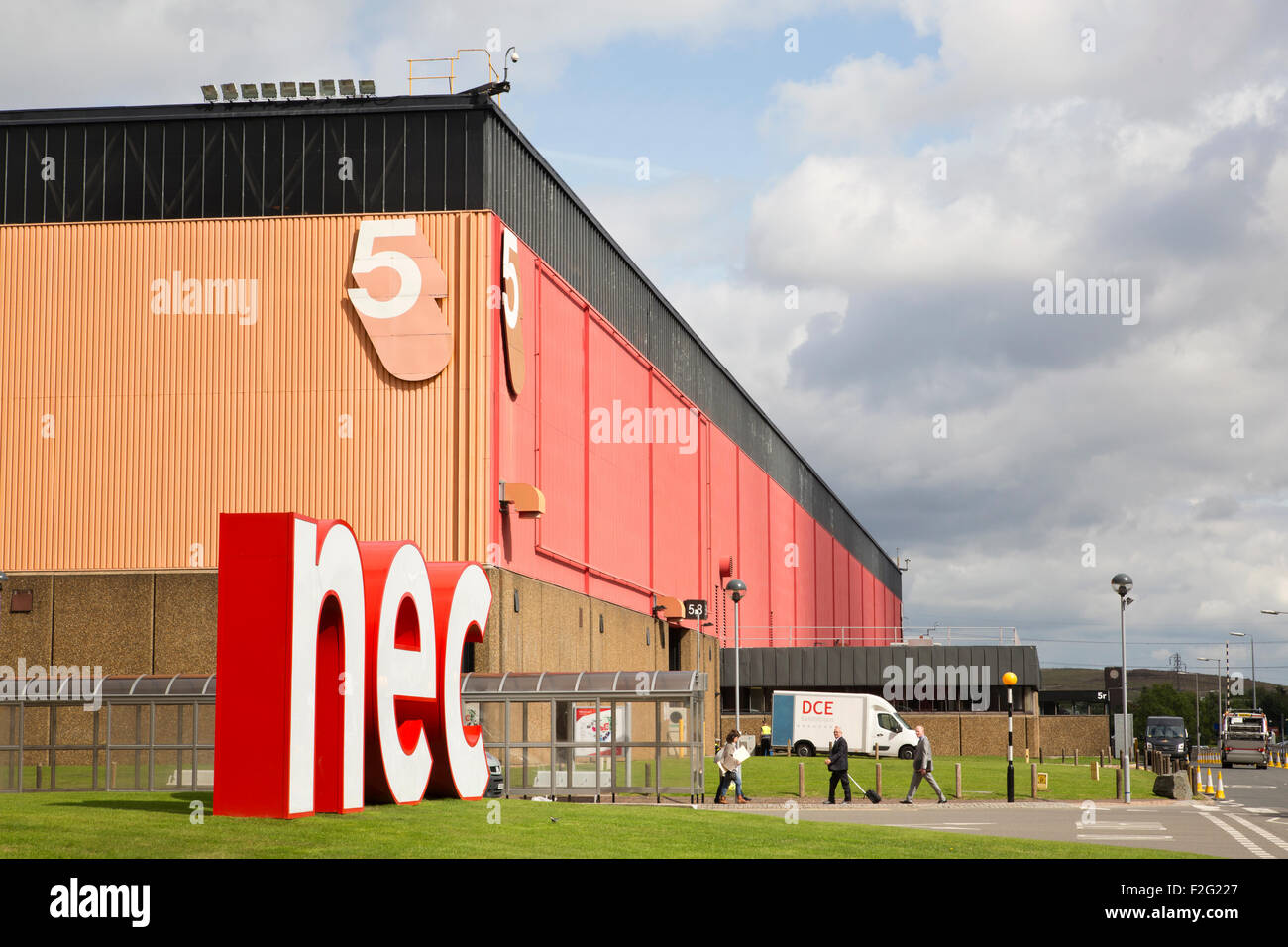 NEC Birmingham sign and Hall 5 Stock Photo - Alamy