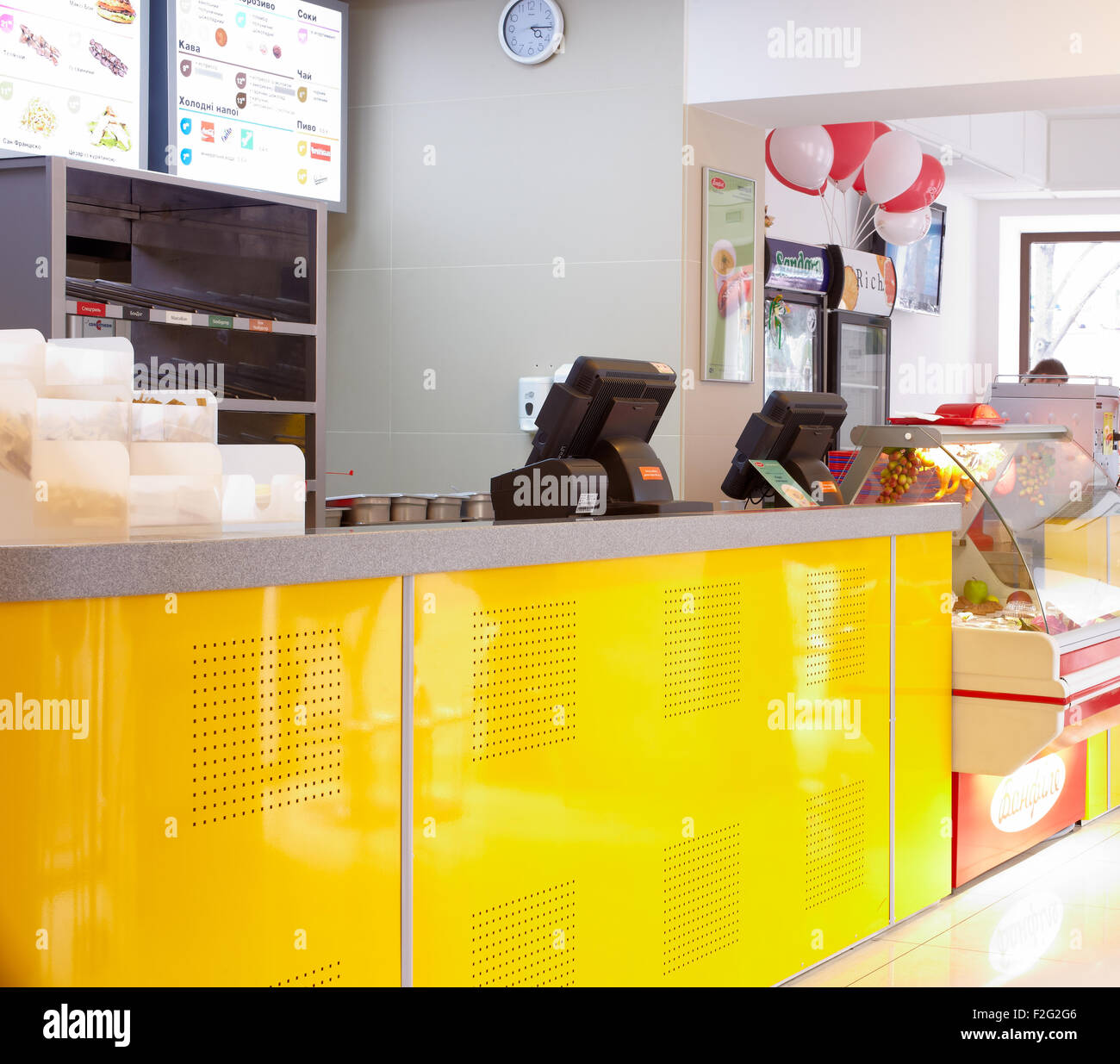 Interior of a yellow fast food restaurant Stock Photo - Alamy