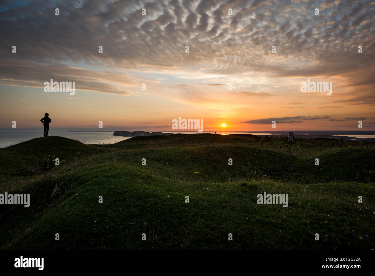 Sunset at Five Barrows Bronze Age barrow cemetery on Brook Down, Isle ...