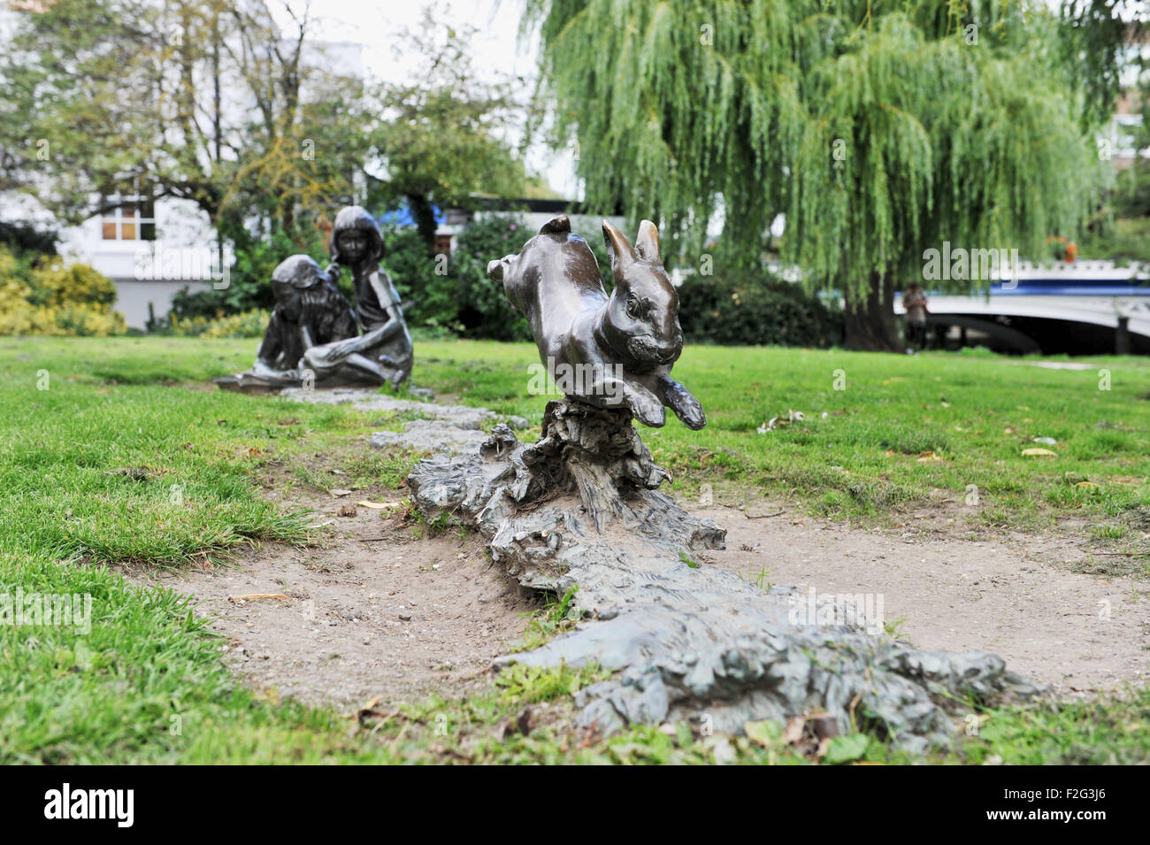 Guildford UK - Alice and The White Rabbit sculpture statue by River Wey ...