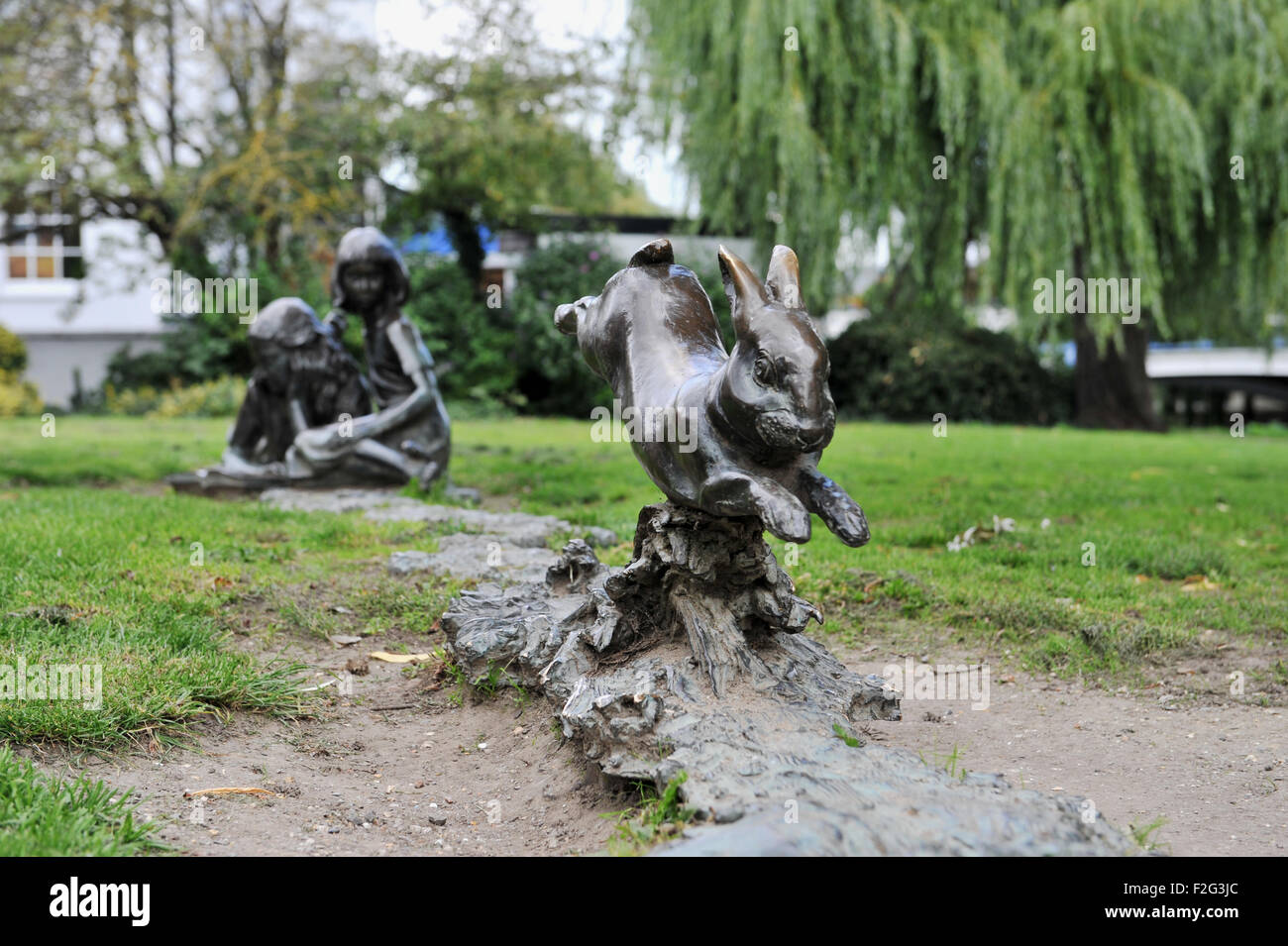 Guildford UK - Alice and The White Rabbit sculpture statue by River Wey ...