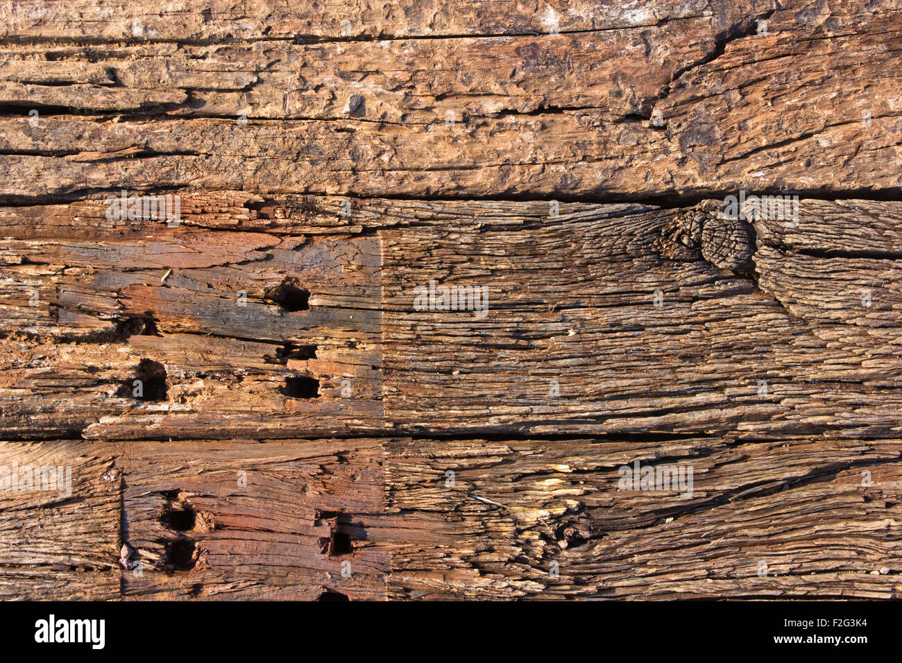 Pile of track sleeper wooden stack background Stock Photo - Alamy