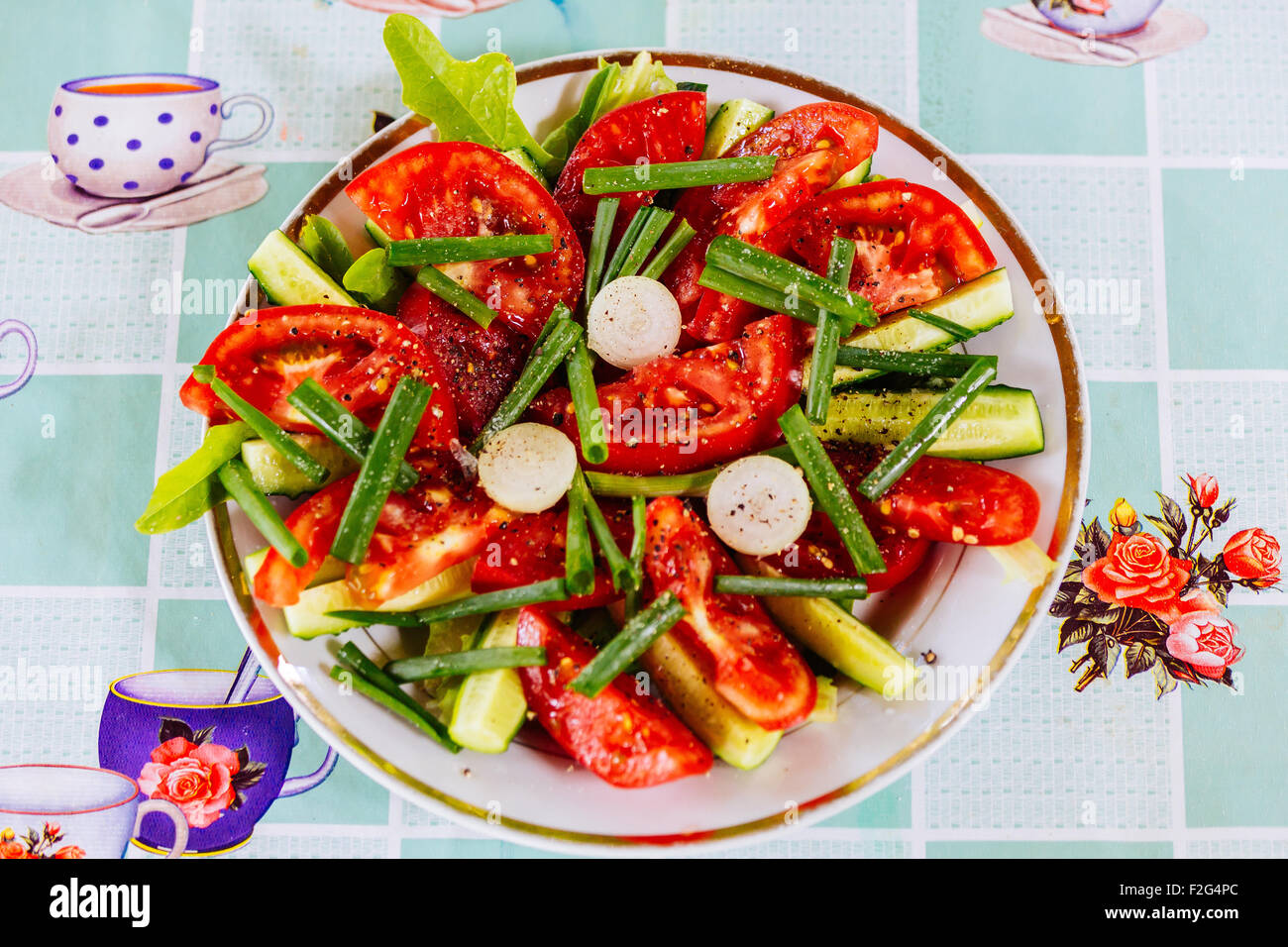 Plate with mix vegetable salad seasoned vegetable oil, salt and ground ...
