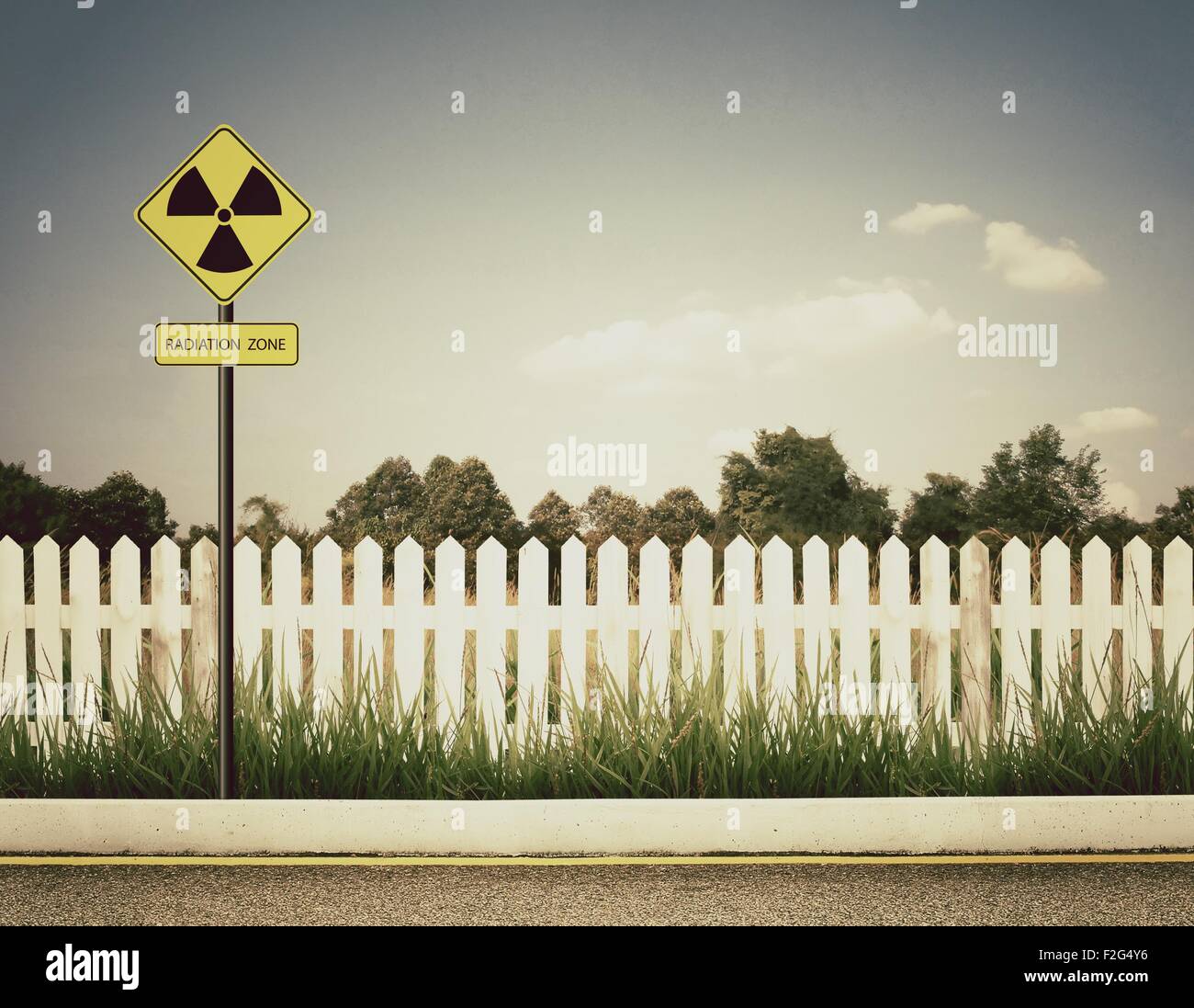 nuclear radiation warning symbol with blue sky Stock Photo - Alamy