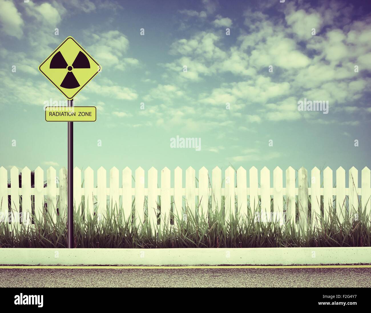 nuclear radiation warning symbol with blue sky Stock Photo - Alamy
