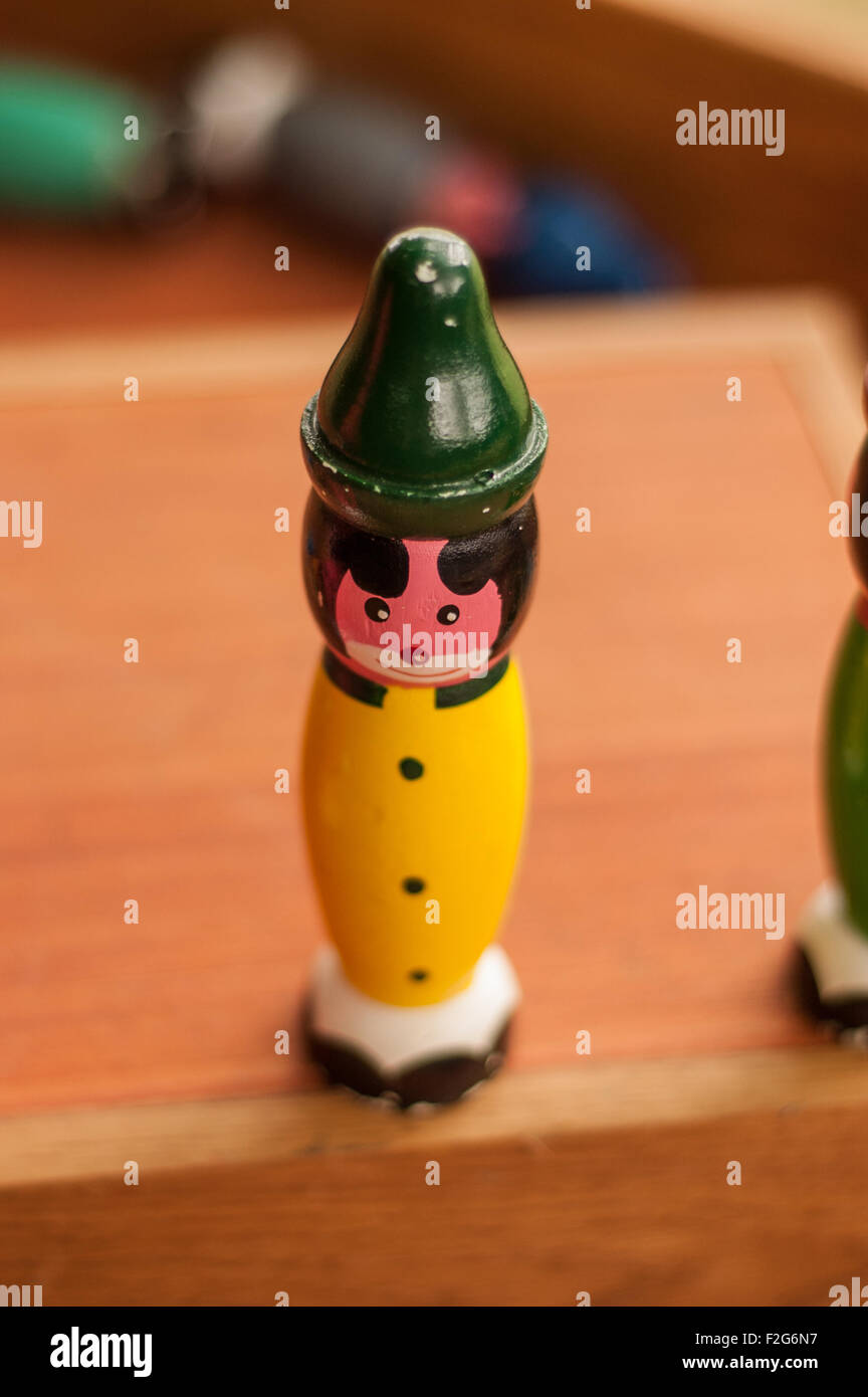 Kids skittle toy figures standing up Stock Photo - Alamy