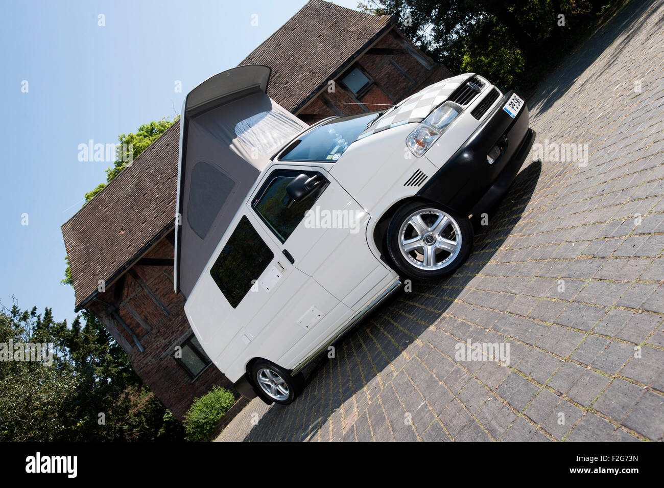 VW Volkswagen T4 camper van with pop top and bonnet protector Stock ...