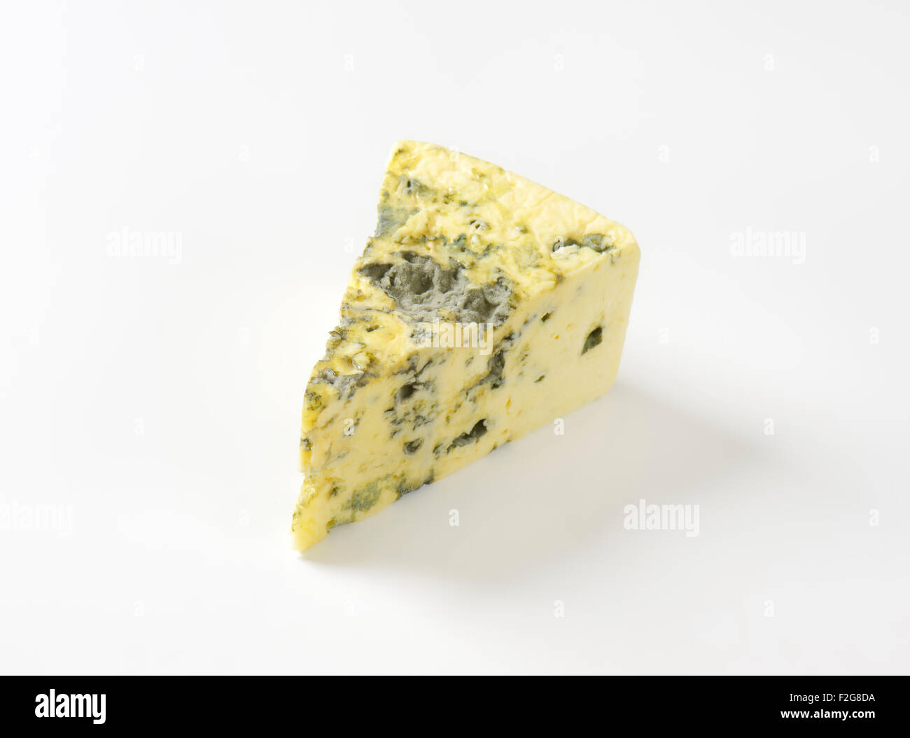 Wedge of French blue cheese Stock Photo - Alamy