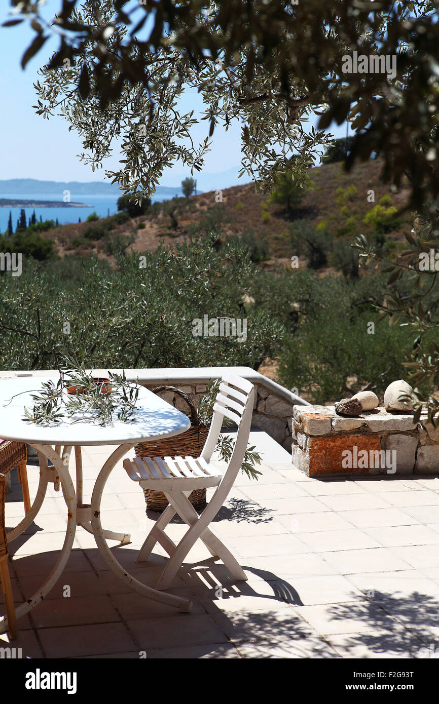 Outdoor dining table on terrace Stock Photo - Alamy