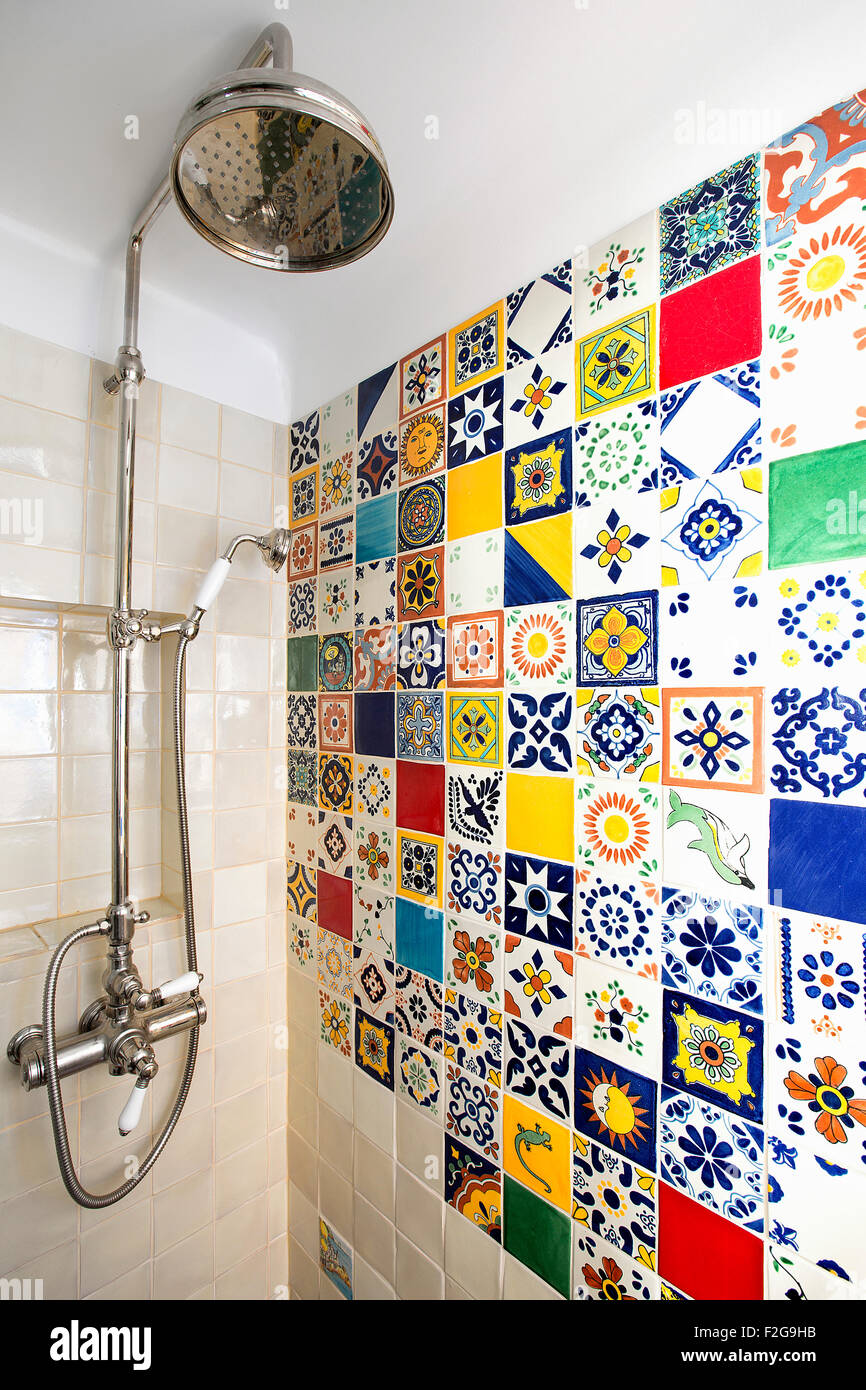 Shower wall with colorful decorative tiles Stock Photo - Alamy