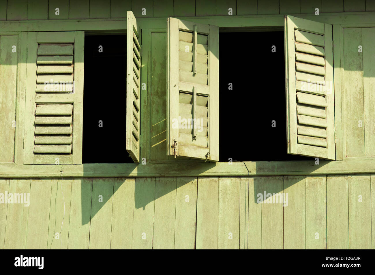 Facade and Windows of Shophouse Stock Photo - Alamy