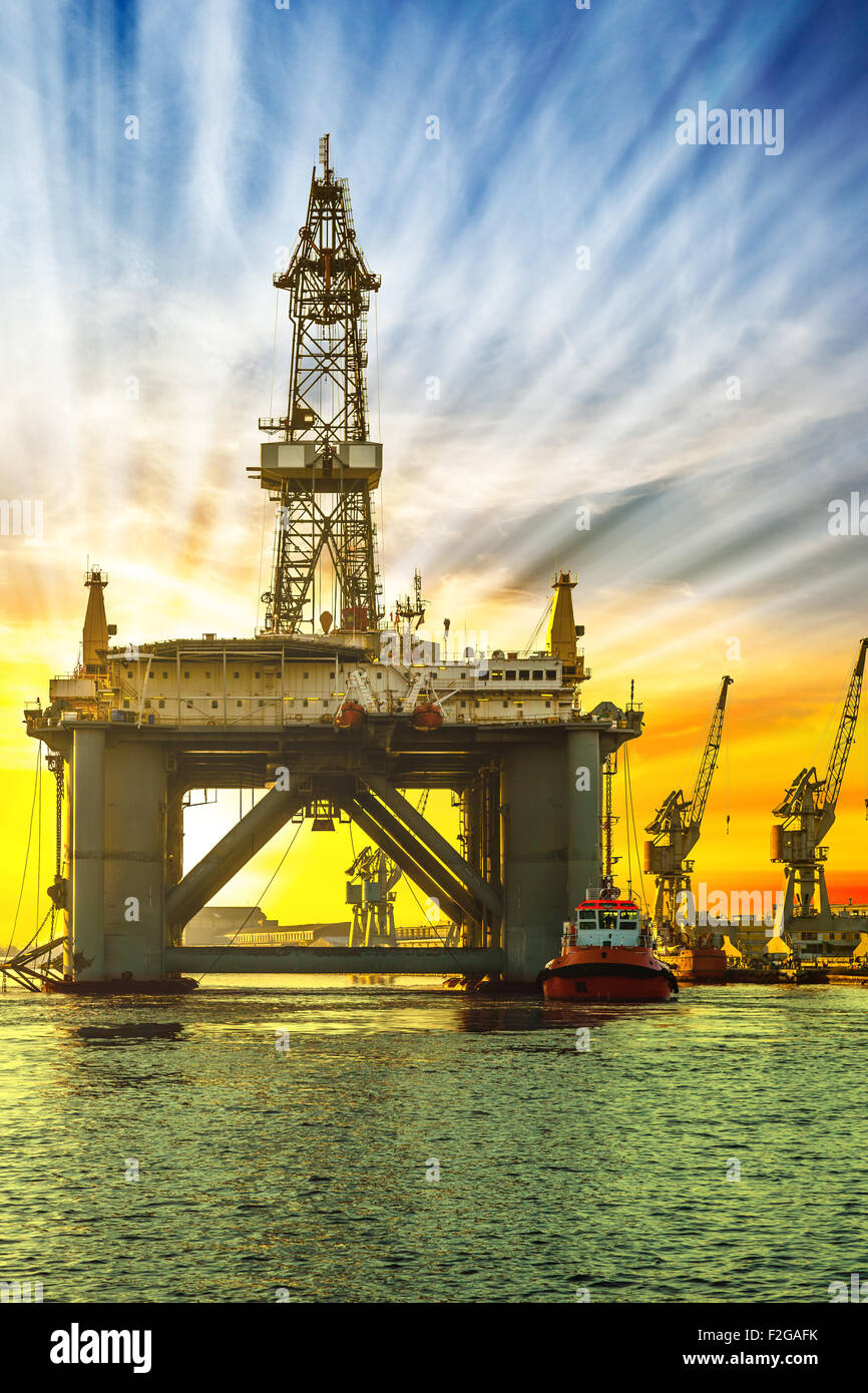 Vessel engaged towing Oil Rig in the Port of Gdansk, Poland Stock Photo ...