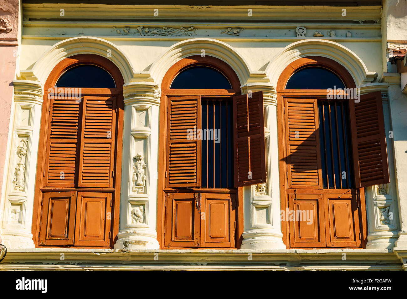 Facade and Windows of Shophouse Stock Photo - Alamy