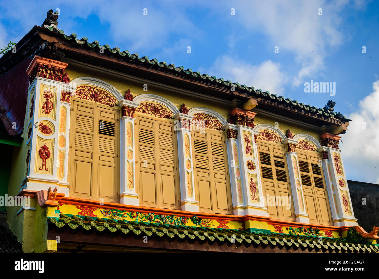 Facade and Windows of Shophouse Stock Photo - Alamy