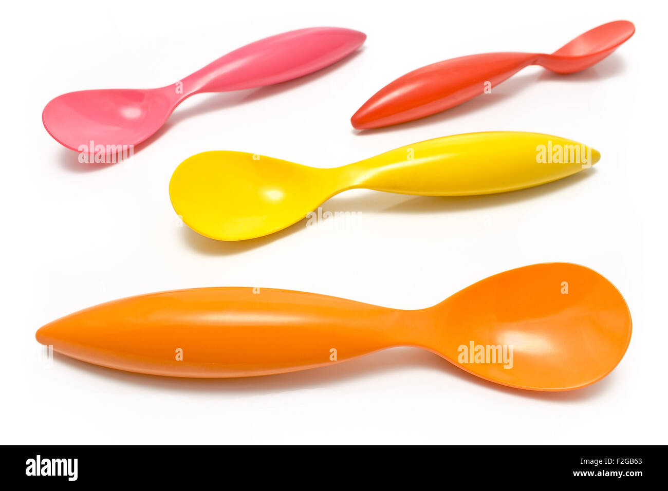 Colorful spoons isolated on white Stock Photo - Alamy