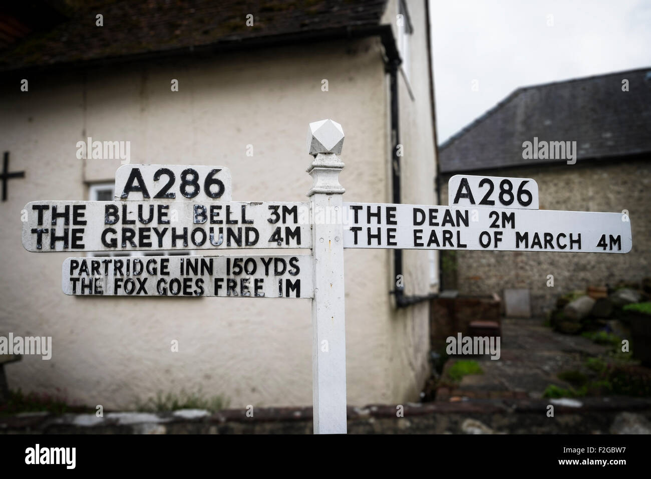 Unusual Road sign on A286 showing distances to public houses pubs ...