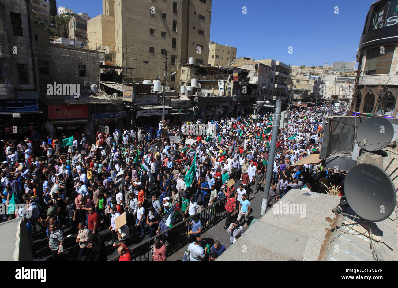 Amman, Jordan. 18th Sep, 2015. People shout slogans during an anti ...