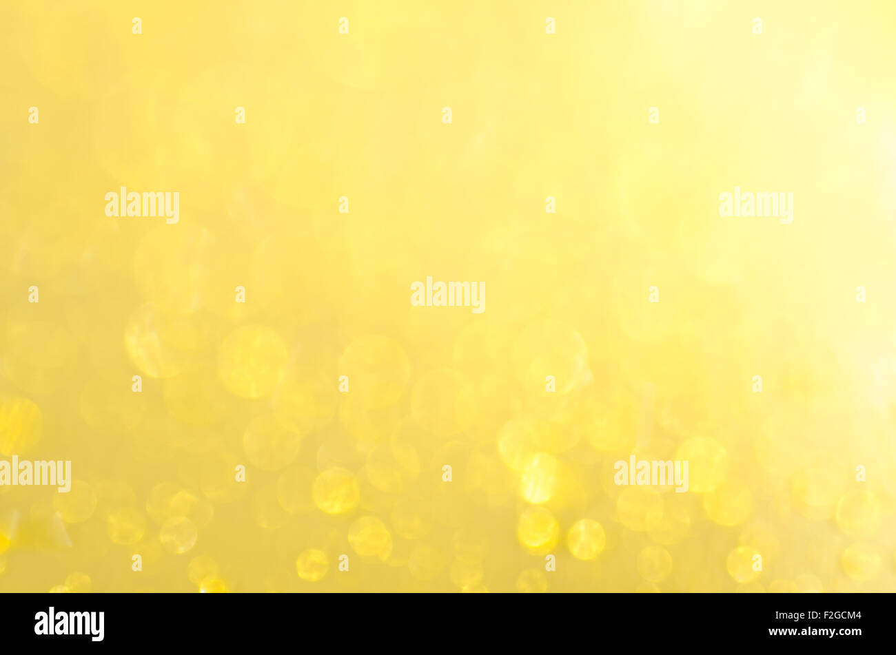 Blurry yellow gold lights hi-res stock photography and images - Alamy