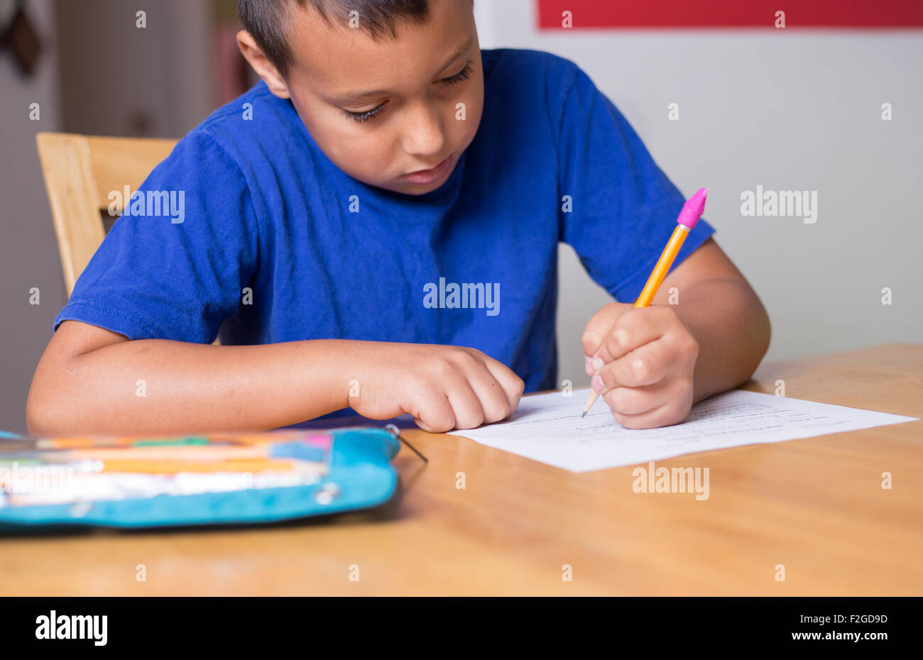 Homeschool boy doing homework and learning at home Stock Photo - Alamy