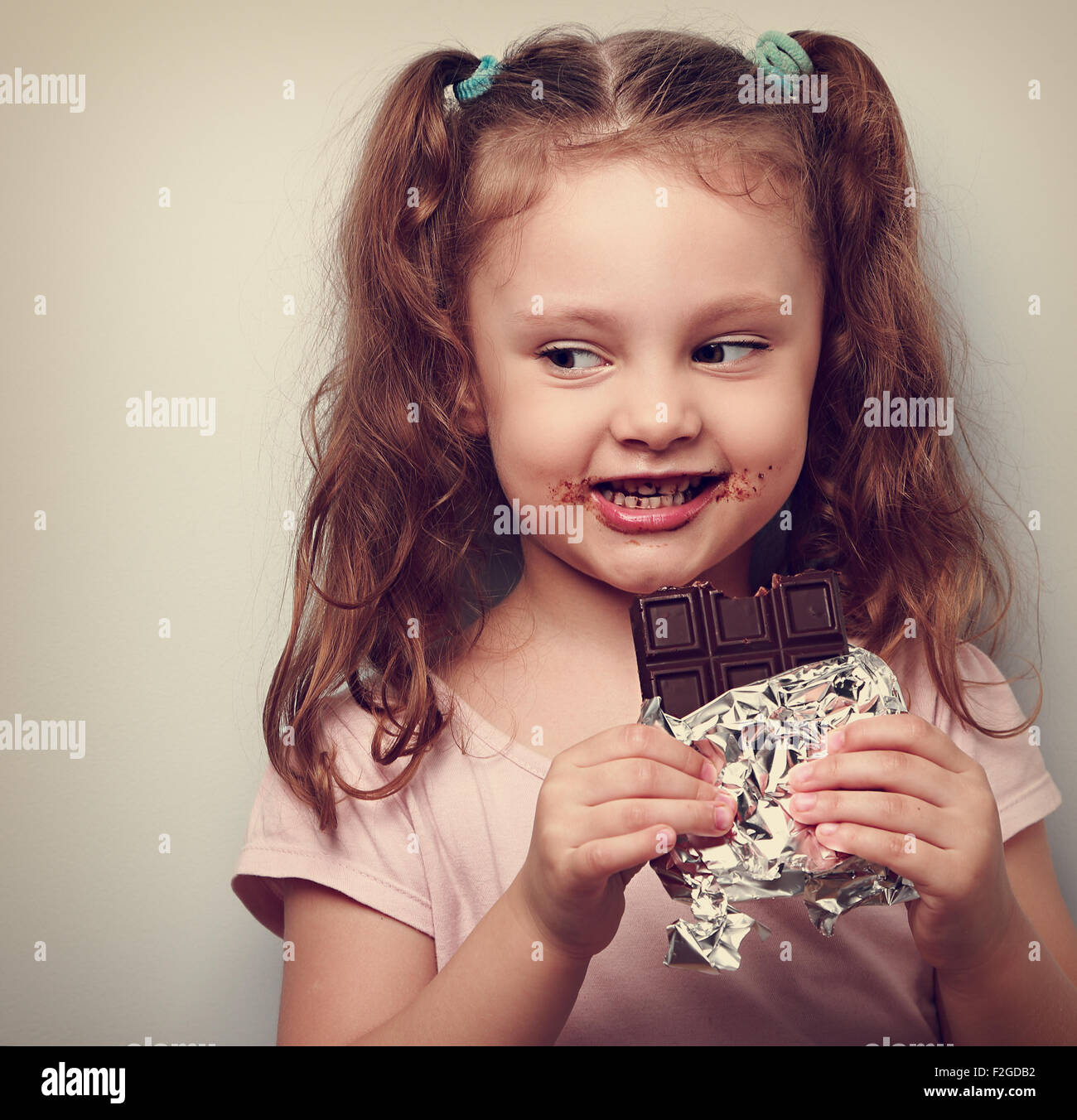 Child eating chocolate hi-res stock photography and images - Alamy