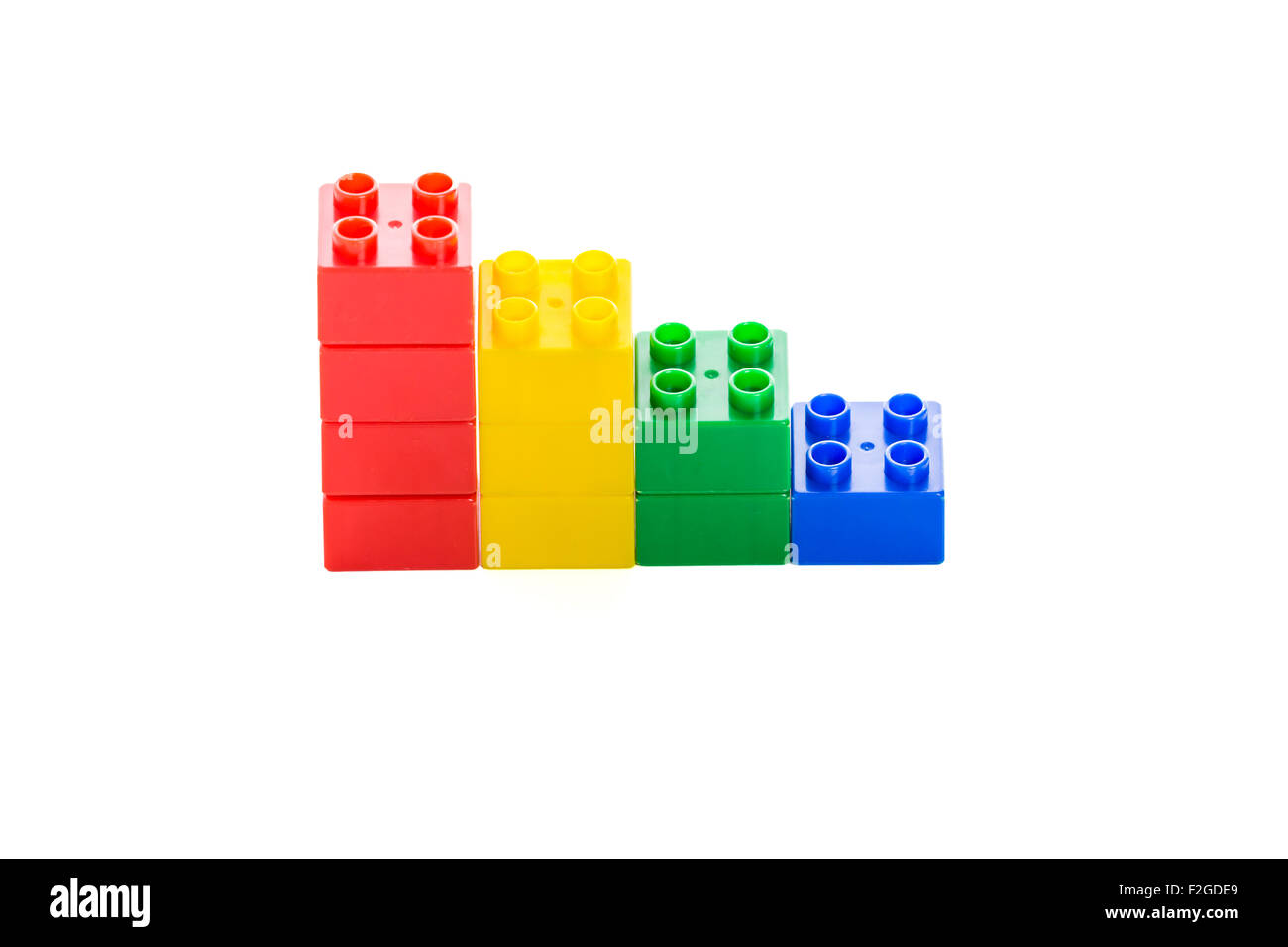 Colorful plastic building bricks on isolated white background Stock ...