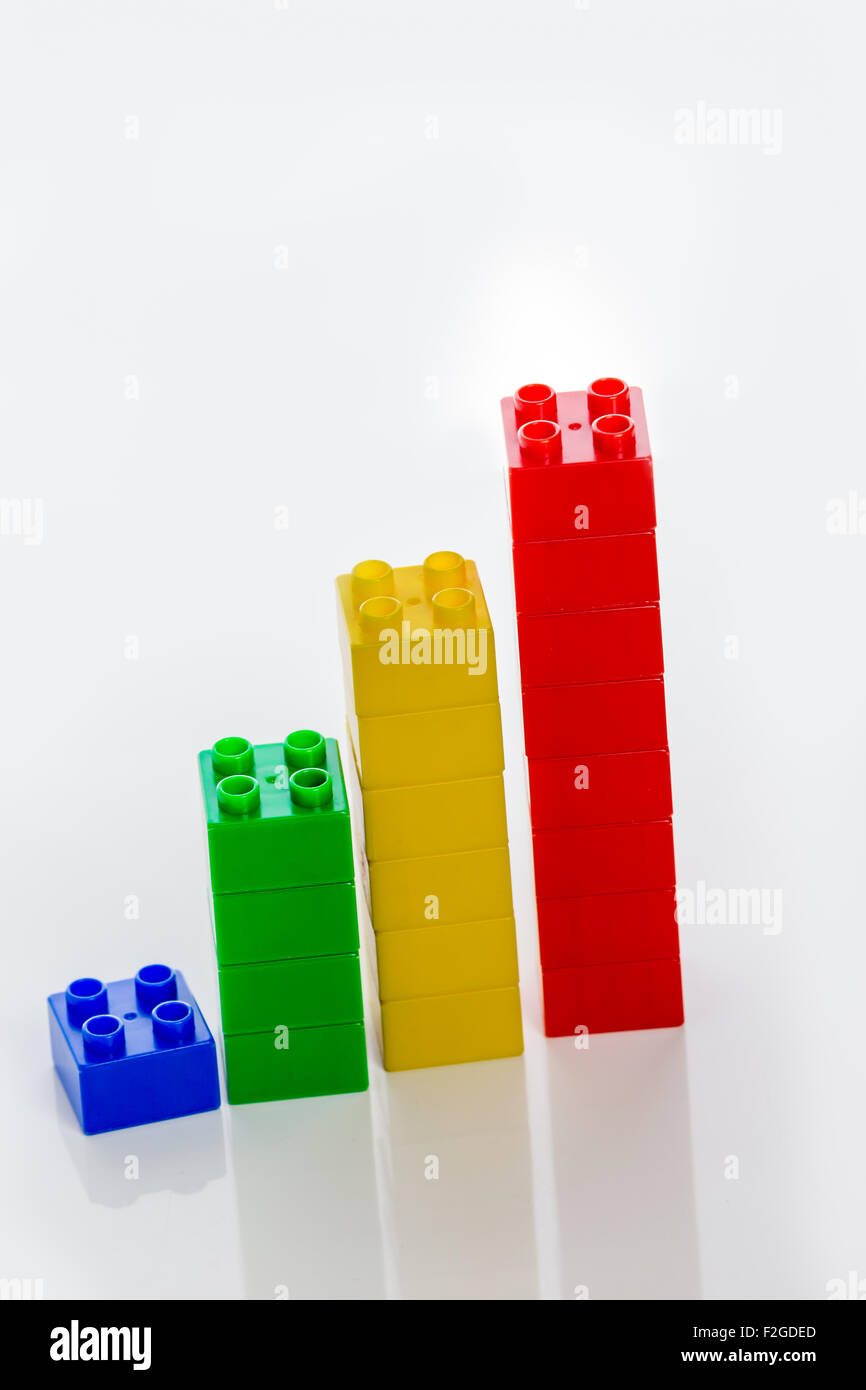 Colorful plastic building bricks on white background Stock Photo - Alamy