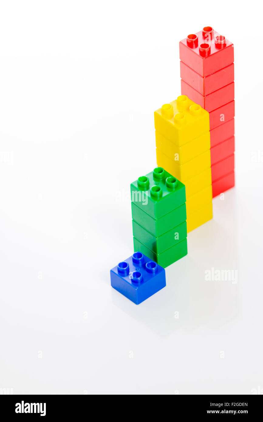 Colorful plastic building bricks on isolated white background Stock ...