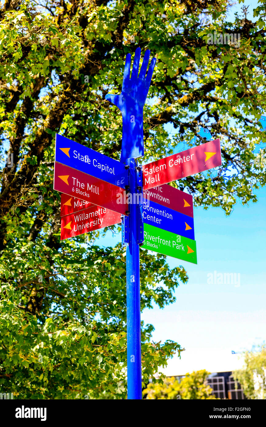 Colorful multi-sign pedestrian signpost in Salem, Oregon Stock Photo ...
