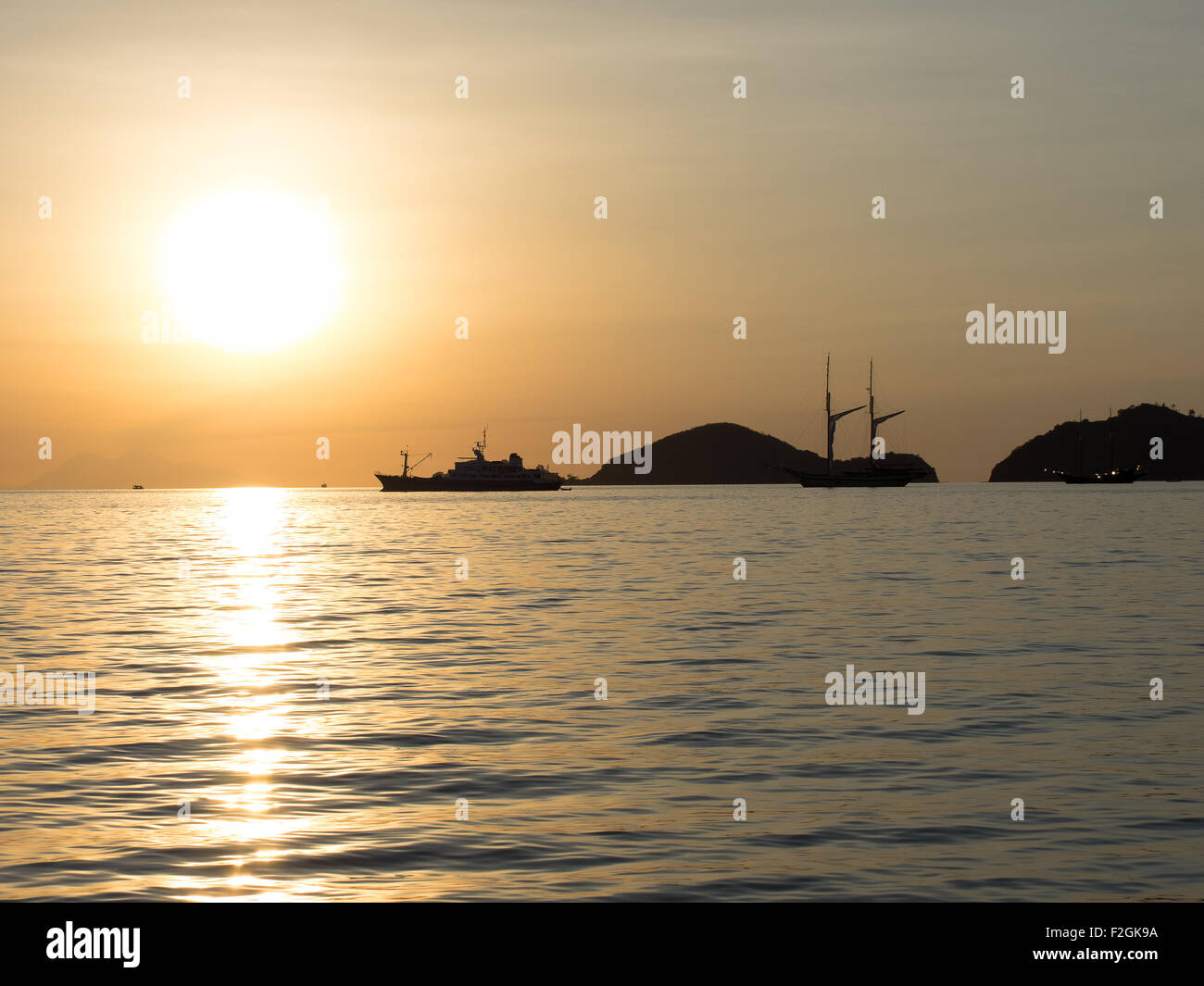 Sunset on flores island, bali, indonesia Stock Photo - Alamy