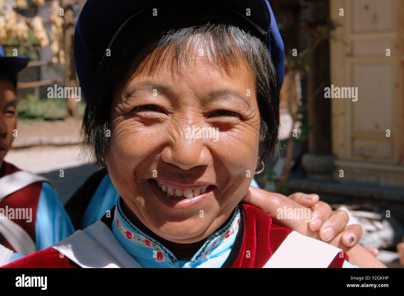 Shu He / Yunnan Province, China: Naxi woman with a big smile performing ...