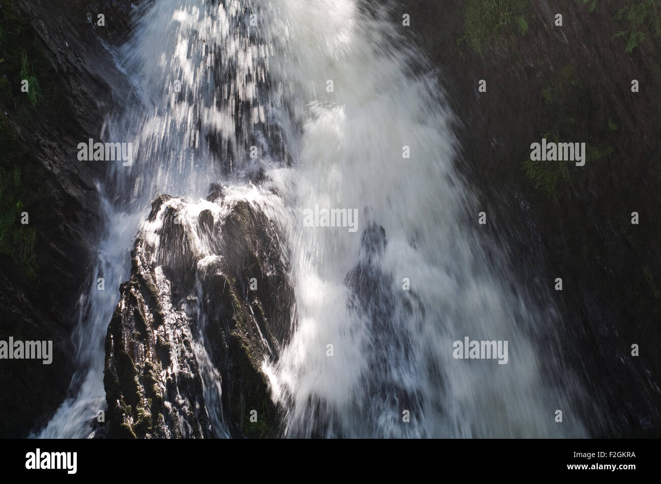 Water splashing down a waterfall Stock Photo - Alamy