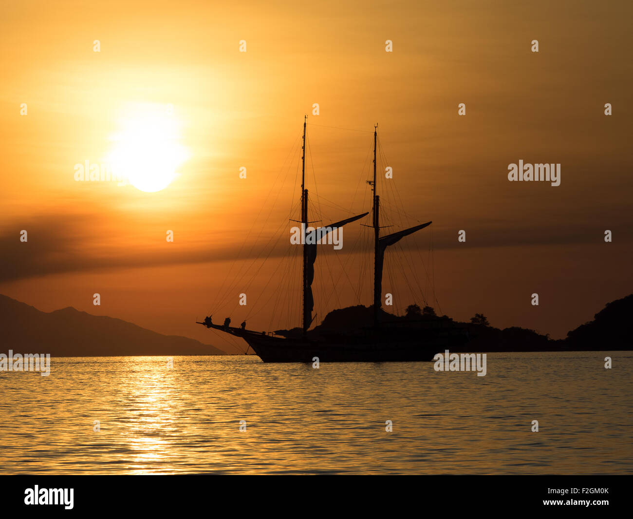 Sunset on flores island, bali, indonesia Stock Photo - Alamy
