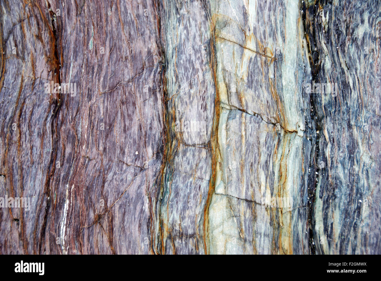 Blue purple white rock face closeup Stock Photo - Alamy