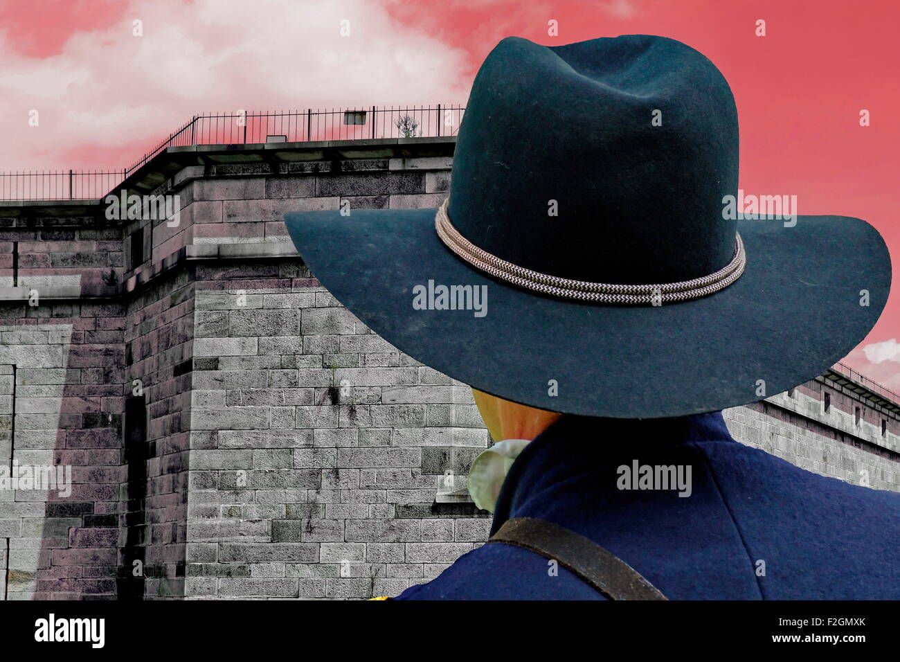 Composite photo- Union officer reenactor gazes at Ft. Delaware, sky is ...