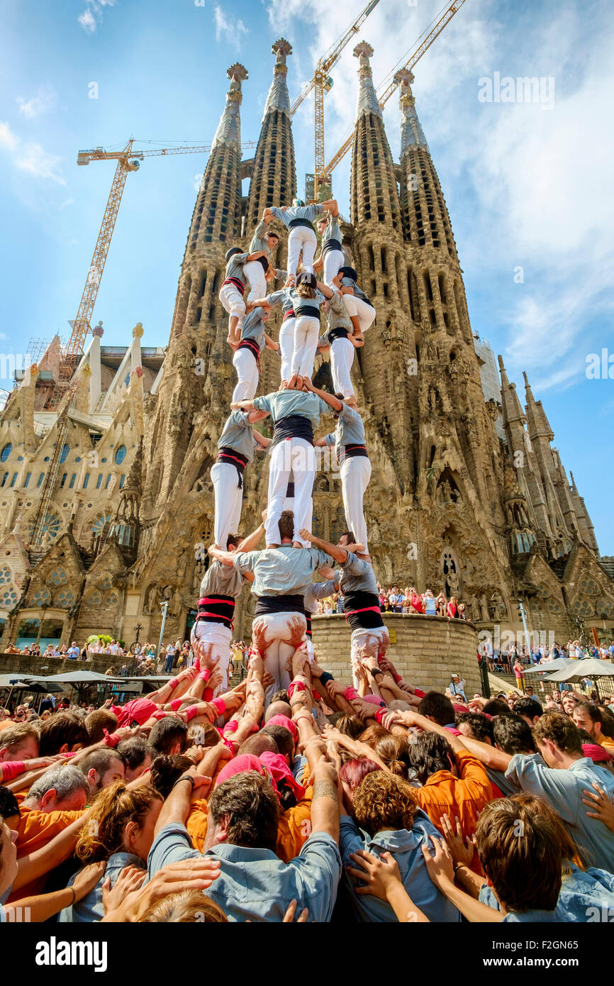 Castellers building human towers at the Sagrada Família, Barcelona ...
