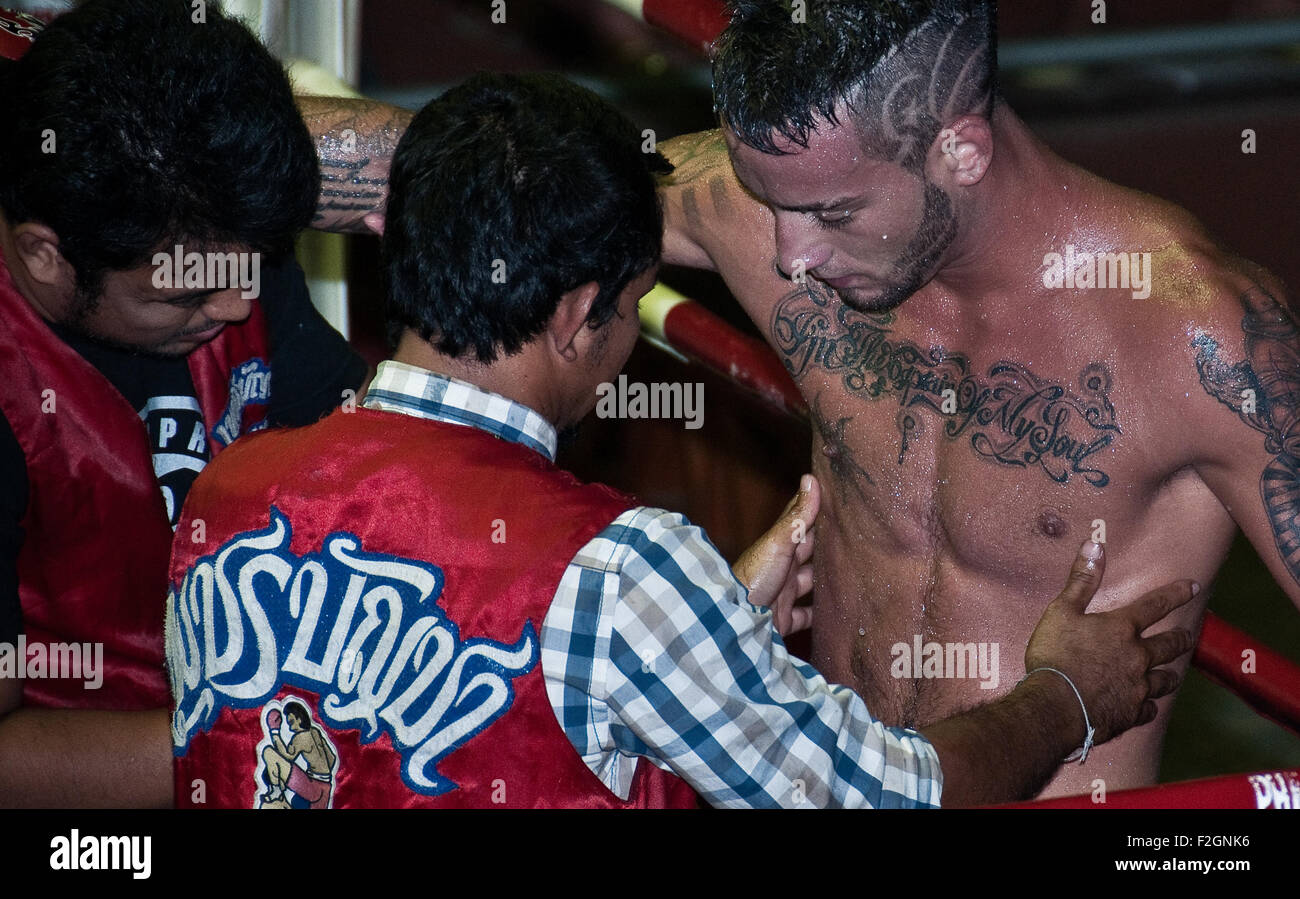 Muay Thai fight in Thailand boxing stadium Stock Photo - Alamy
