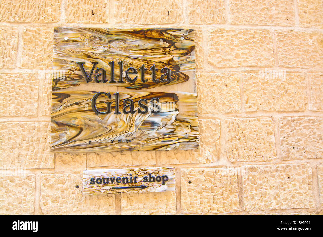 Valletta glass sign within old city walls Stock Photo - Alamy