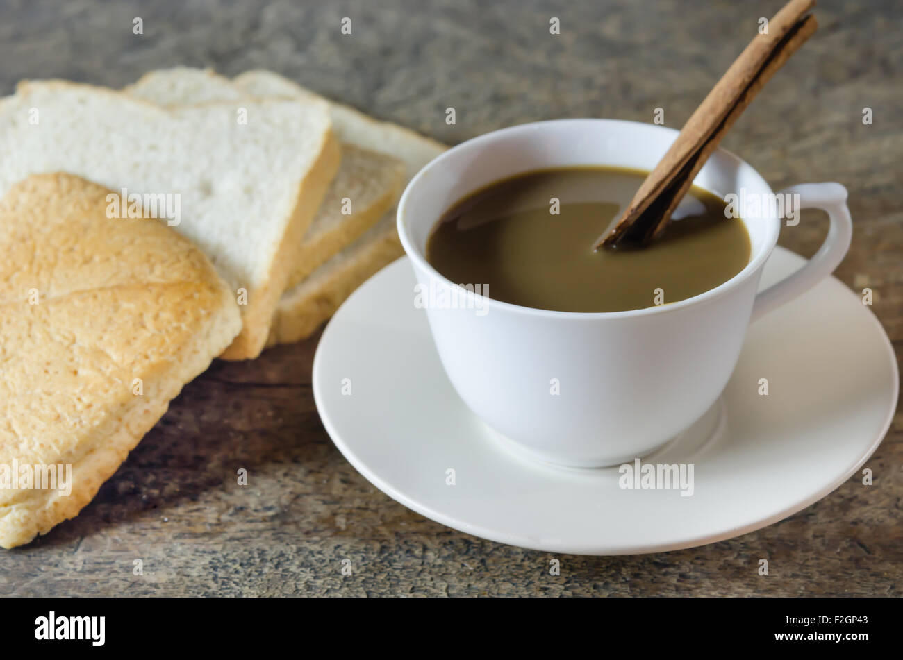 hot coffee with fresh bread on wooden background , still life Stock ...
