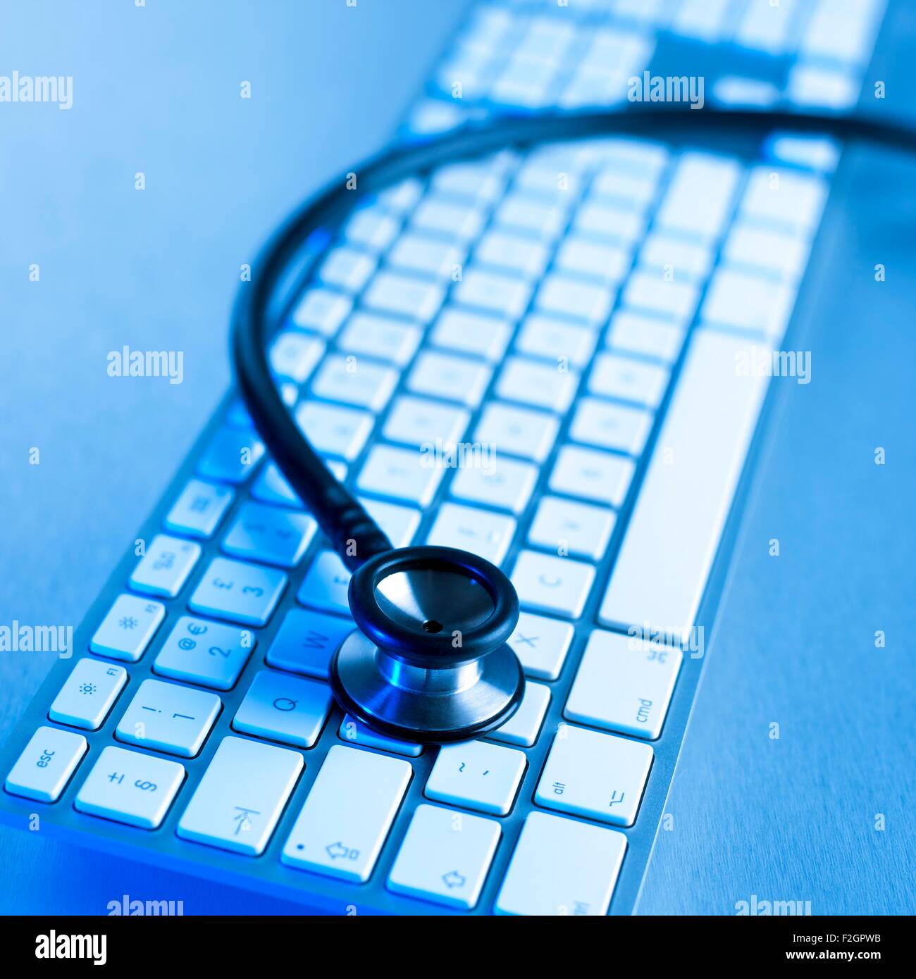 Computer keyboard and stethoscope Stock Photo - Alamy