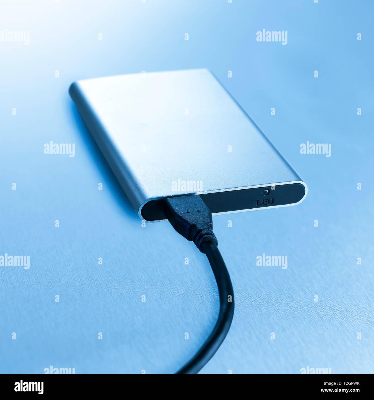 Hard drive and connecting cable Stock Photo - Alamy