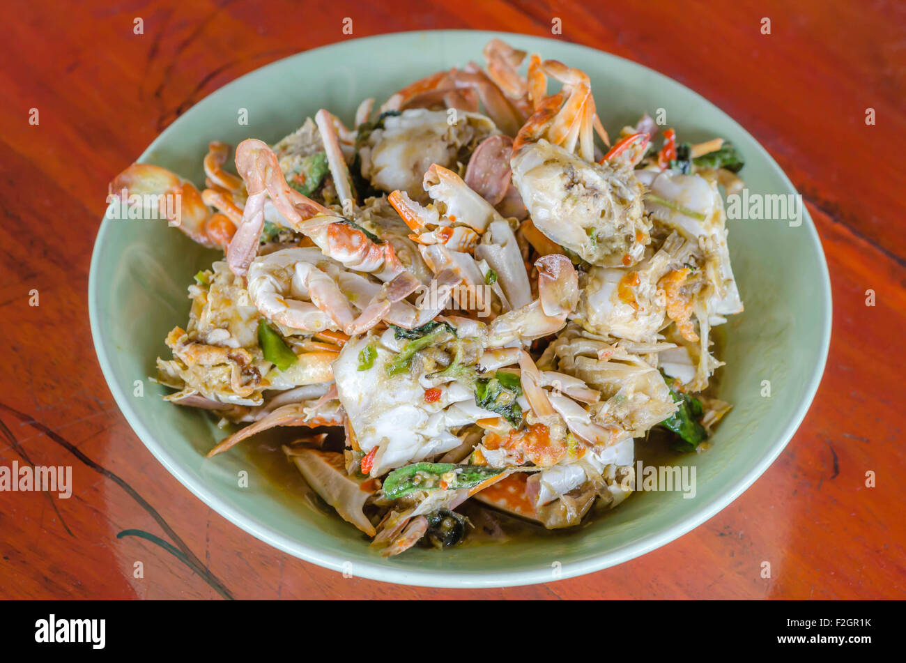 Stir fried Crab with chili & Basil leaves , spicy seafood dish Stock ...