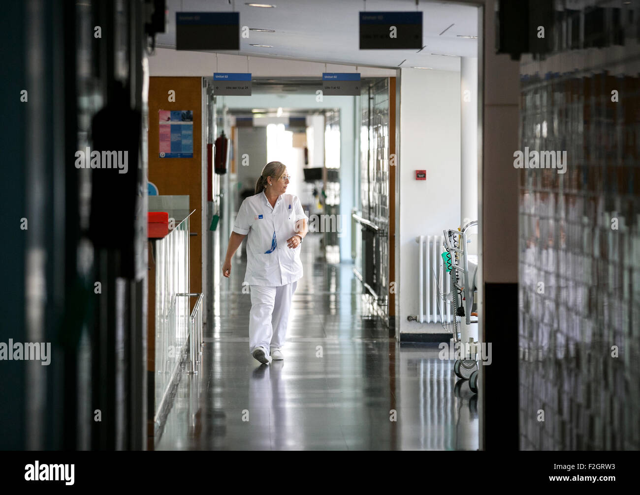A nurse walks inside a hospital in the Spanish island of Mallorca Stock ...