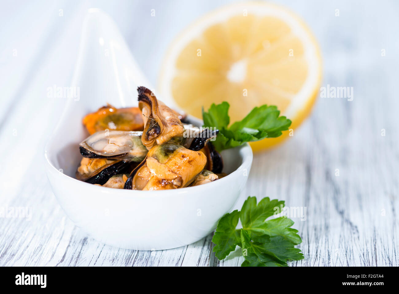 Pickled Mussels (with fresh herbs) as detailed close-up shot Stock ...