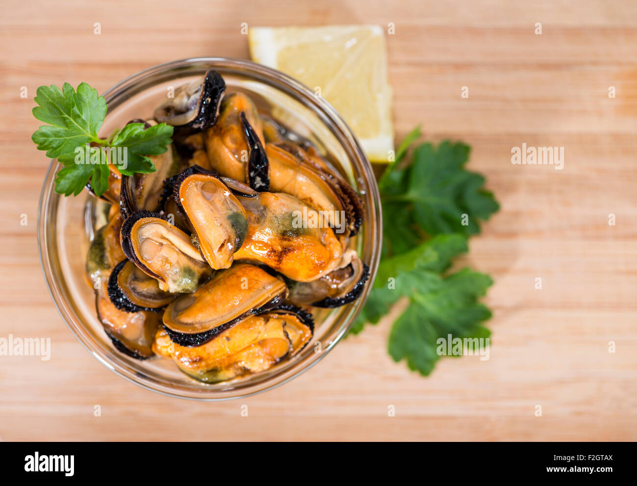 Pickled Mussels (with fresh herbs) as detailed close-up shot Stock ...