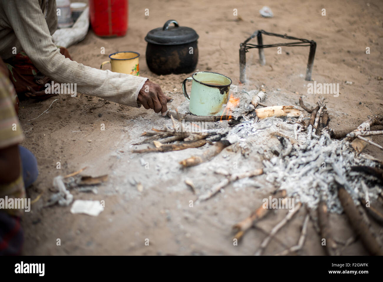 San people, or bushmen building fire in Botswana, Africa Stock Photo ...