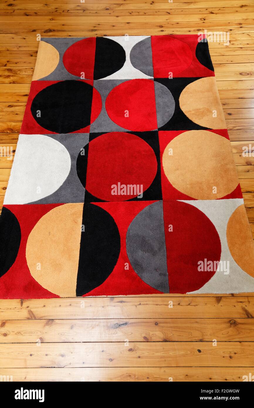 A rug with colourful circular patterns Stock Photo - Alamy