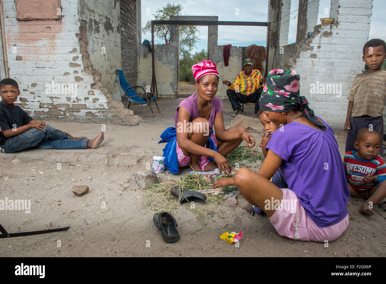 Bushmen or San people preparing food in Botswana, Africa Stock Photo ...
