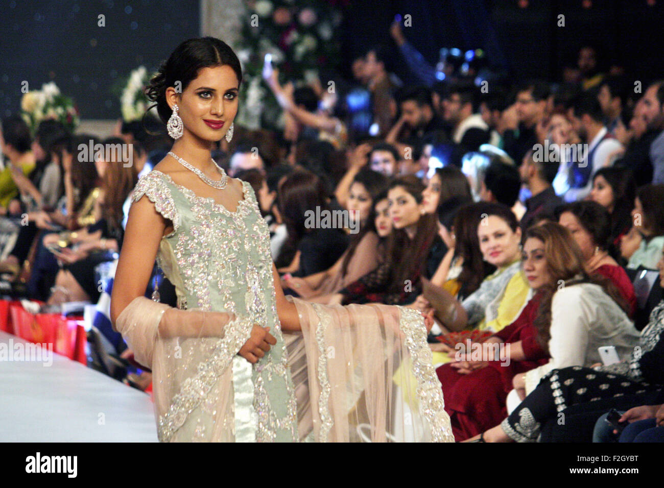 Lahore. 18th Sep, 2015. A model presents a creation by Pakistani designer Amara Khan on the last ...